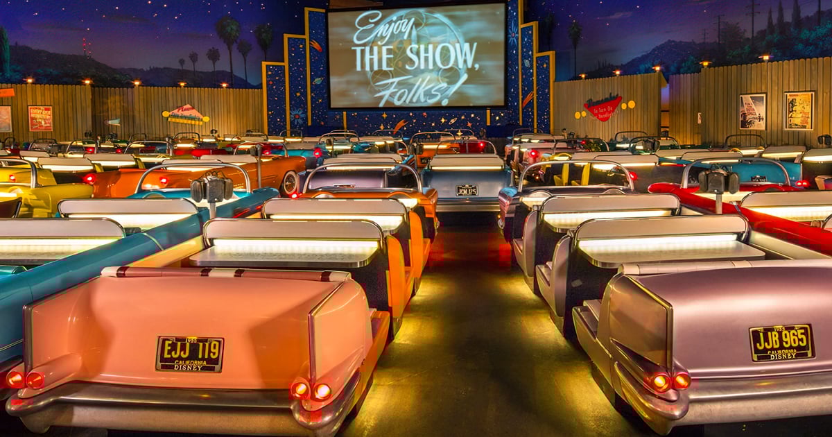 Your dining room is a fleet of candy-colored convertibles under a starlit sky, because someone finally figured out how to make indoor parking actually exciting. Photo credit: Sci-Fi Dine-In Theater Restaurant