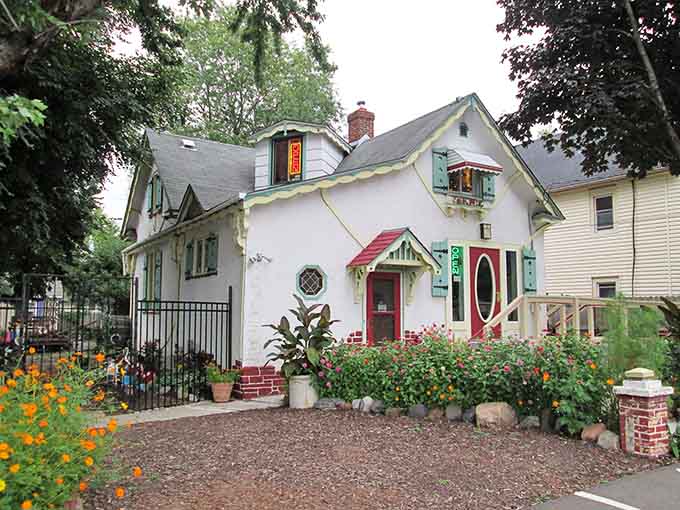 This storybook cottage exterior practically begs you to come inside and discover what treasures await, like finding Narnia but with better jewelry.