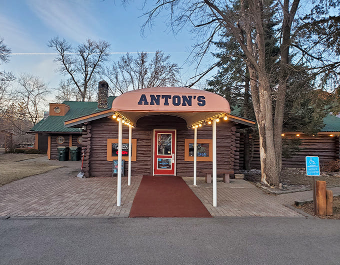 That log cabin exterior with twinkling lights looks like where Paul Bunyan would take Babe for their anniversary dinner.