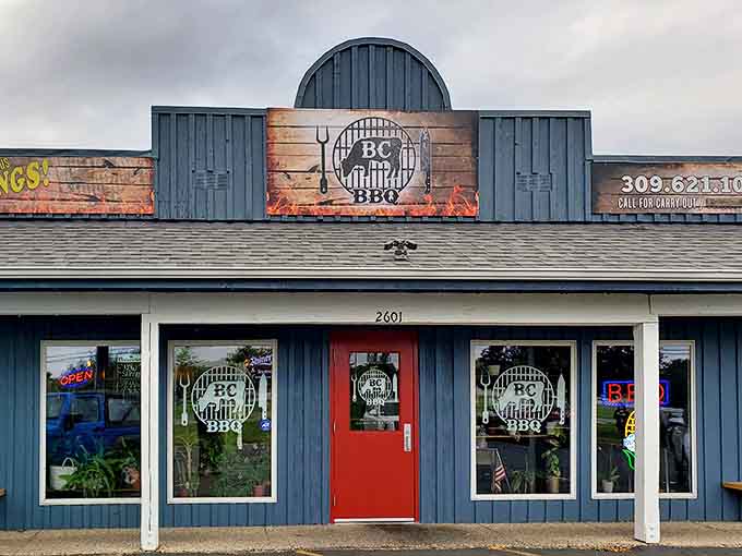 That bright red door is your gateway to some of the finest smoked meats in central Illinois, beckoning like a barbecue beacon.
