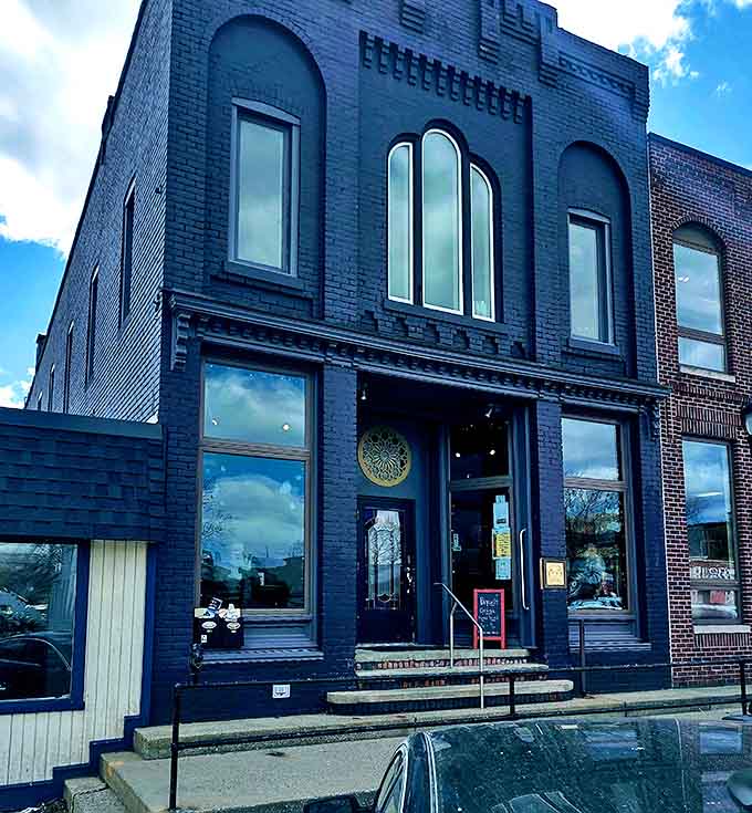 The striking navy-blue brick facade of Bearded Lamb Brewing Company stands out in Plymouth like a beacon for thirsty travelers seeking craft beverage nirvana.