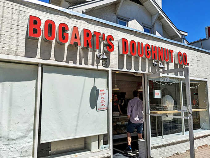 The unassuming white brick facade of Bogart's Doughnut Co. belies the extraordinary treats waiting inside. Those red letters promise sweet perfection!
