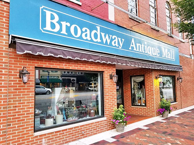 The iconic blue awning of Broadway Antique Mall beckons treasure hunters into a brick time capsule where Lebanon's past lives on through carefully curated collectibles.