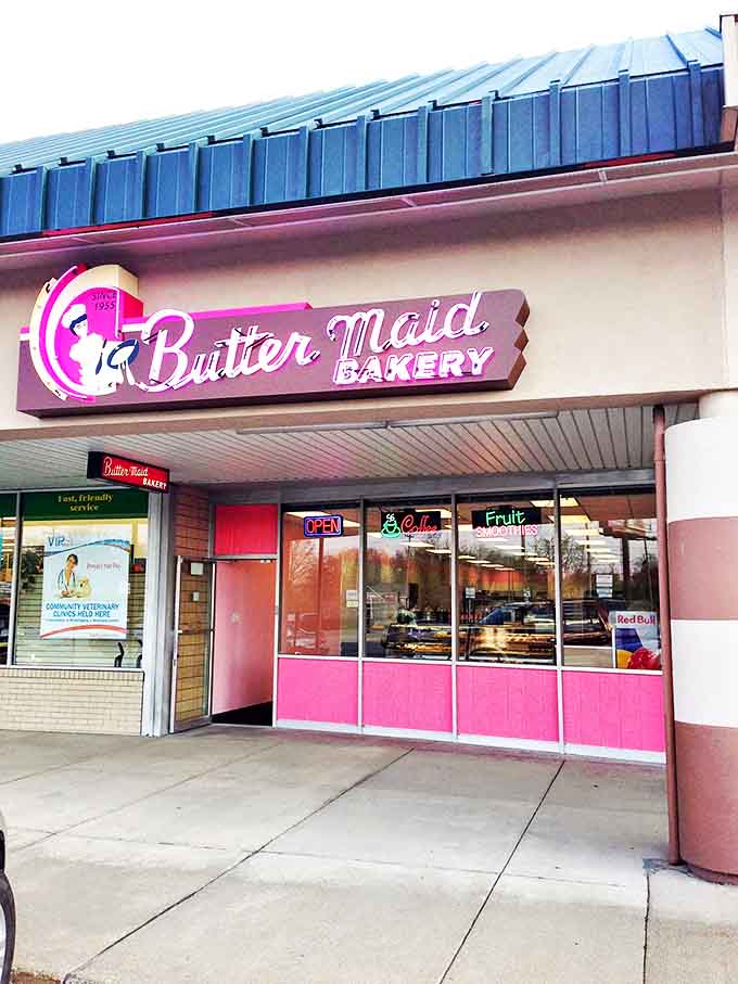 The iconic pink-trimmed storefront of Butter Maid Bakery glows like a beacon for sweet-toothed pilgrims, promising Old World delights inside.