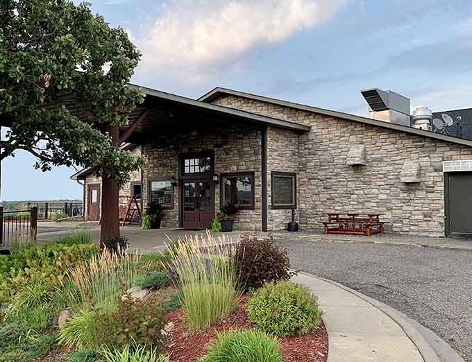 The stone and timber exterior promises warmth and great food before you even walk through the door.