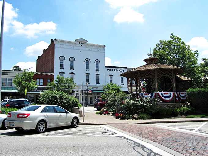Chagrin Falls: Historic storefronts frame the village center like a perfectly composed painting, where brick buildings and American flags create that "where has this been all my life?" feeling.