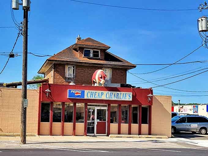 Exterior: The iconic red-awninged building with its famous pig mascot perched on top stands as Rochester's beloved breakfast beacon.