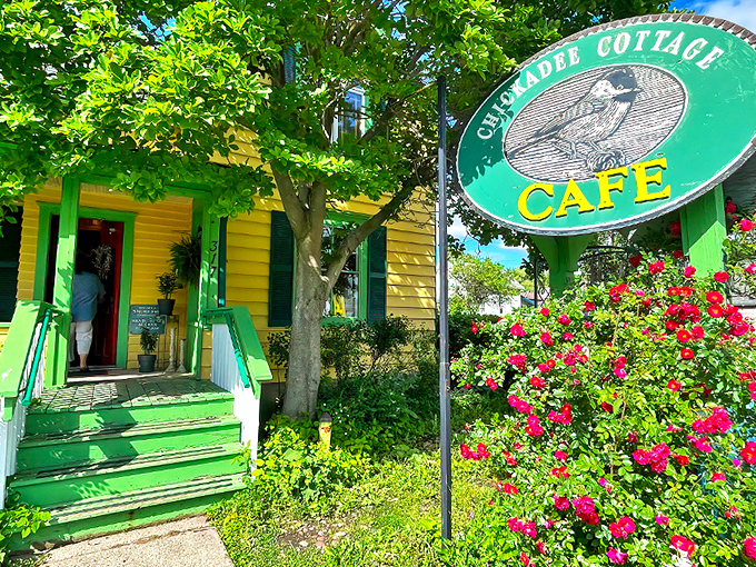 A cheerful yellow cottage with vibrant green trim beckons visitors like a slice of sunshine in Lake City, Minnesota.