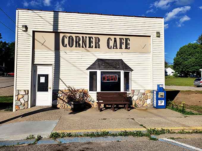 The unassuming exterior of Corner Cafe stands like a culinary lighthouse, promising home-cooked goodness behind its modest facade.