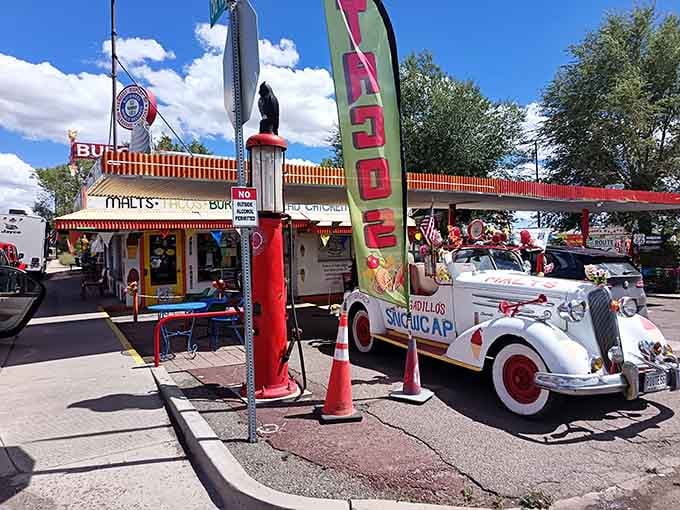 That red-and-white striped awning and vintage ride combo is basically screaming "Pull over right now!" louder than your GPS ever could.