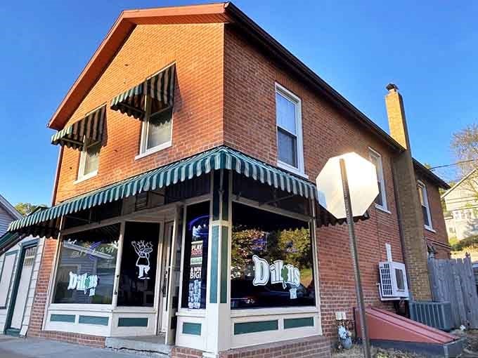 A charming brick corner building with distinctive green-striped awnings, Dillon's stands as an unassuming treasure in historic Galena's landscape.