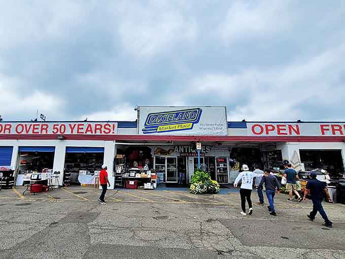 The iconic Dixieland Flea Market exterior welcomes treasure hunters with its bold signage and promise of endless discoveries inside.