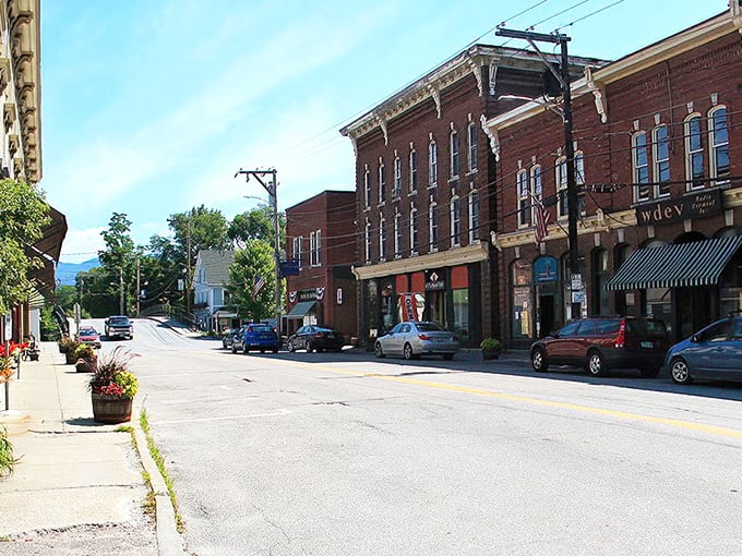 Main Street's historic brick buildings stand sentinel against Vermont's blue skies, offering a perfect backdrop for your Waterbury wanderings.