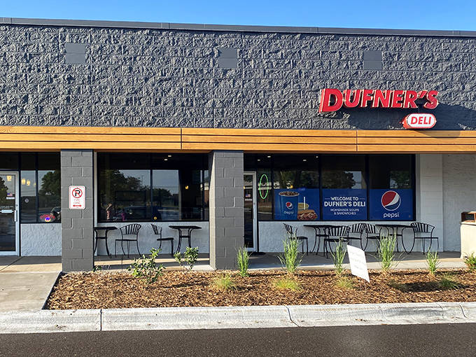Dufner's bold red signage beckons sandwich seekers and donut dreamers alike, promising comfort food nirvana behind those unassuming doors.