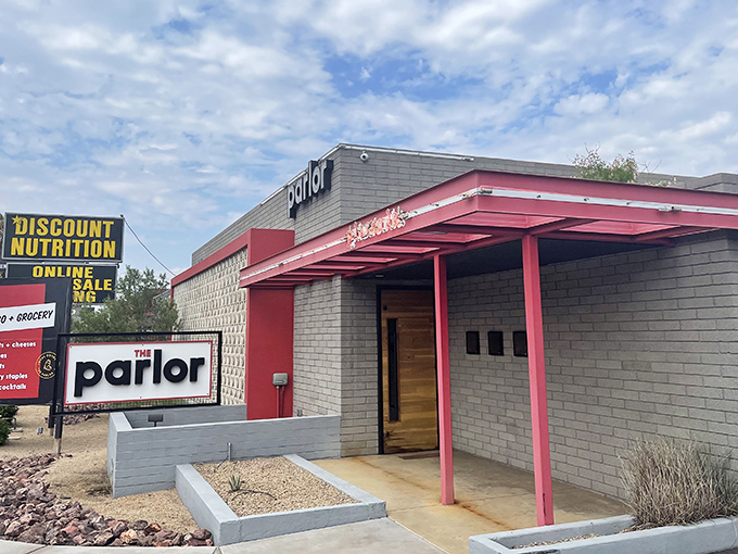 The Parlor's unassuming exterior with its signature pink awning belies the culinary magic happening inside this former beauty salon turned pizza paradise.