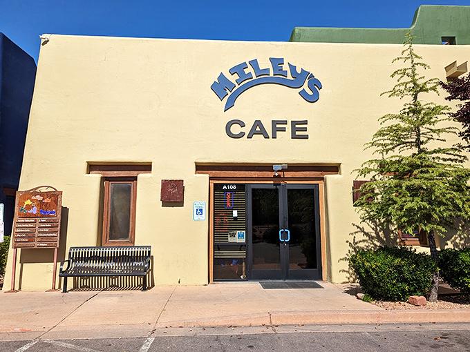 The sunshine-yellow exterior of Miley's Cafe stands like a beacon of culinary promise in Tucson's vibrant landscape.