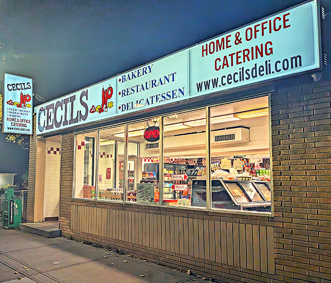 Cecil's iconic storefront glows with promise at dusk, a beacon of deli delights that's been drawing hungry patrons for generations.