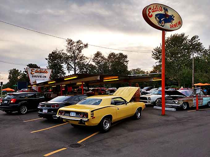 The iconic orange building with its vintage sign stands as a beacon of nostalgia, promising delicious time travel with every visit.