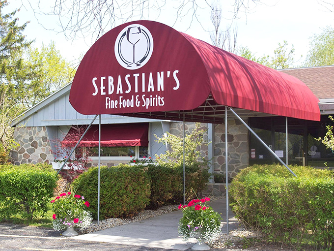 Sebastian's welcoming red awning stands out like a beacon for steak lovers, promising culinary treasures within its stone walls.