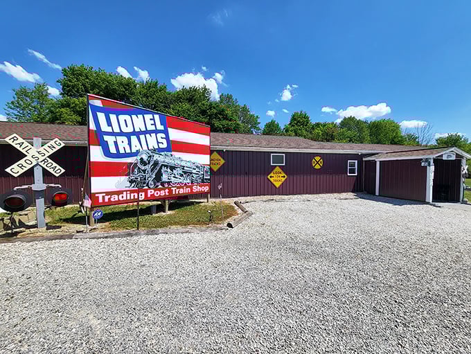 The welcoming facade of Trading Post Train Shop, where miniature adventures begin with that iconic Lionel Trains sign.