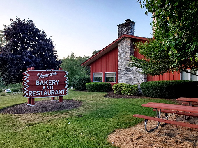 The iconic red exterior of Harner's stands like a beacon of comfort food hope, promising sweet treasures within its humble walls.