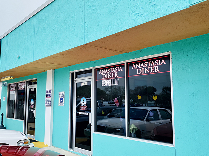 The turquoise exterior of Anastasia Diner stands out like a cheerful beacon, promising Florida sunshine in food form.