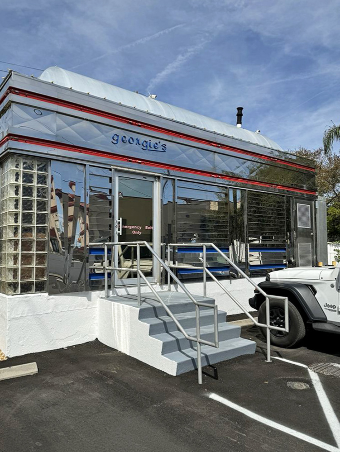 Gleaming like a chrome time machine, Georgie's classic aluminum exterior promises delicious nostalgia before you even step inside.