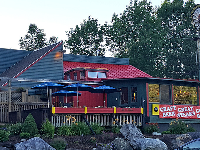 Casey's Caboose exterior beckons with its distinctive red roof and promise of craft beer and great steaks &ndash; a Vermont landmark that stops traffic.