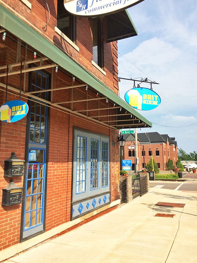 That glowing blue oval sign is basically a bat signal for anyone who spent their youth pumping quarters into arcade machines.