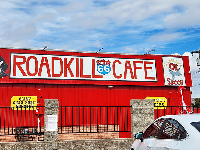 The unmistakable red exterior of Roadkill Cafe announces itself with Route 66 pride and that unforgettable slogan: "You kill it, we grill it."