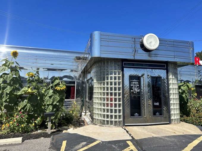 A gleaming time capsule on East 55th Street, where stainless steel and glass blocks promise nostalgic delights within.
