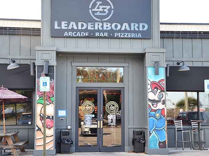 Leaderboard's exterior welcomes gamers and foodies alike with vibrant character murals flanking the entrance &ndash; a colorful preview of the fun inside.