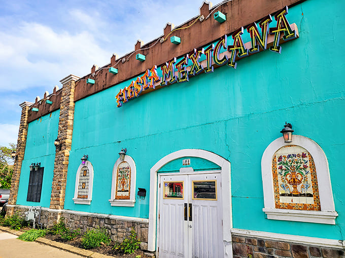The vibrant turquoise exterior of Fiesta Mexicana isn't just eye-catching &ndash; it's a beacon for hungry travelers seeking authentic Mexican flavors in Ohio.