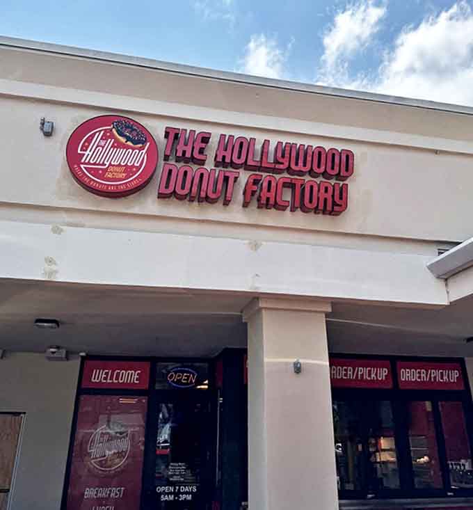 Where the red neon sign beckons like a lighthouse for the carb-deprived, promising sweet salvation in Hollywood's unassuming strip mall landscape.