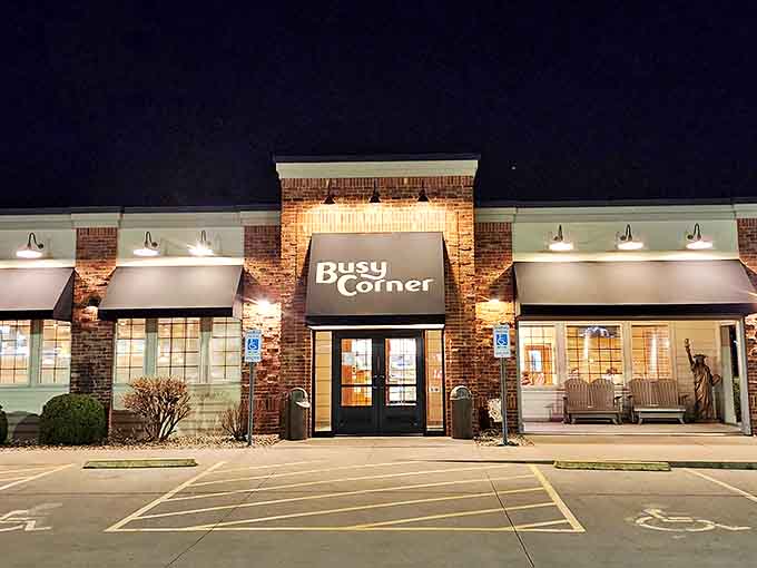 Exterior: Busy Corner's welcoming brick fa&ccedil;ade glows invitingly at dusk, promising comfort and satisfaction behind those double doors.