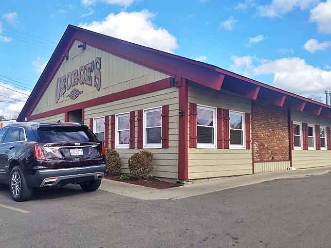 George's Family Restaurant stands proudly against an Ohio sky, its red-trimmed exterior promising comfort food treasures within.