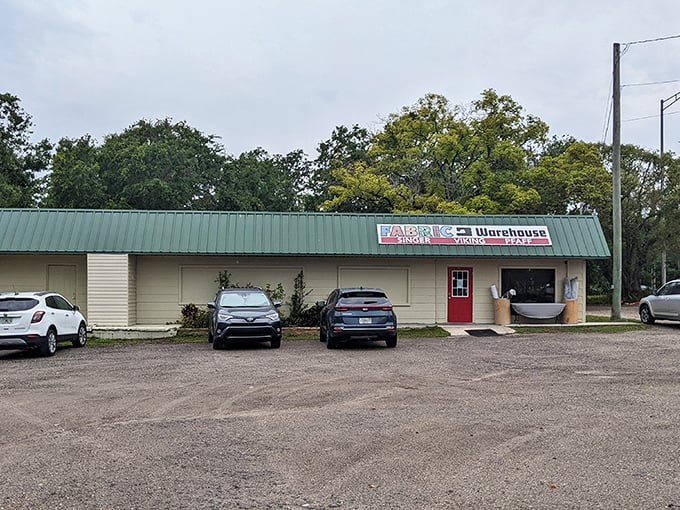 The unassuming exterior of Fabric Warehouse belies the technicolor wonderland waiting inside. Don't judge this fabric book by its cover!