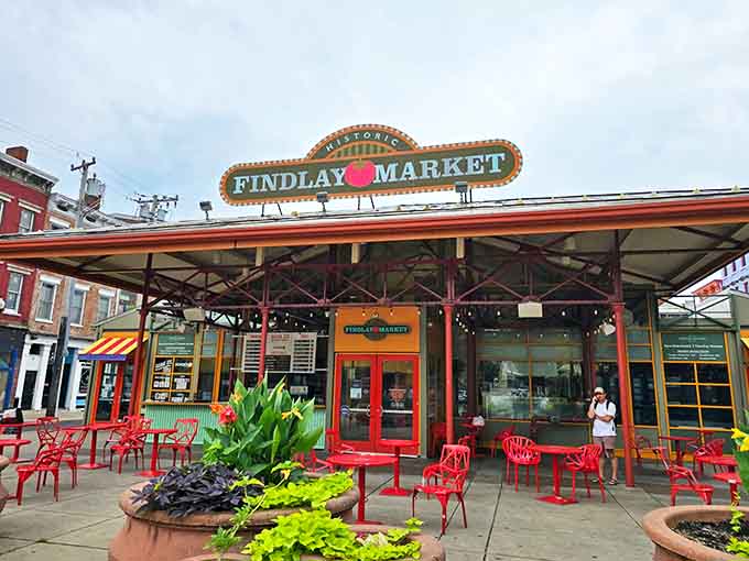 The iconic red-trimmed pavilion of Findlay Market welcomes visitors with its vintage charm and promise of culinary treasures within.