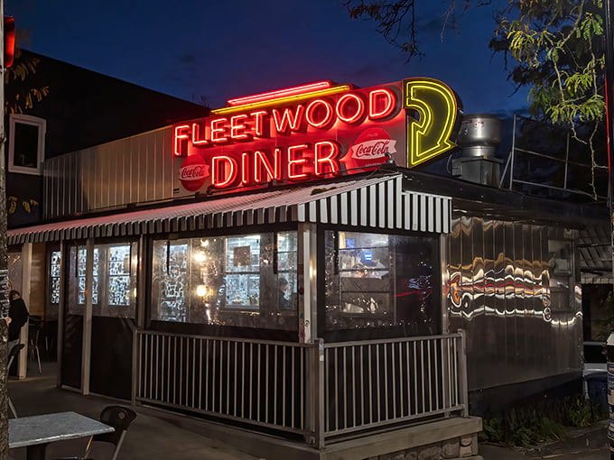 The iconic neon glow of Fleetwood Diner cuts through the evening darkness, a beacon for hungry souls seeking comfort food at any hour.