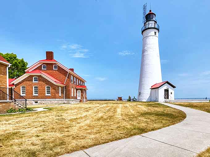 Standing tall since 1829, the Fort Gratiot Lighthouse cuts a striking figure against Michigan's blue skies, its white tower gleaming in the sunlight.