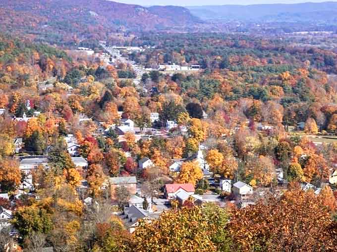 Iron Mountain spreads across the Upper Peninsula like a watercolor painting, where autumn transforms ordinary trees into nature's fireworks display.
