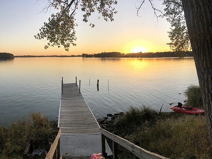 Golden hour at Lake Shetek turns the water into liquid amber, the kind of view that makes you understand why people write poetry about nature.