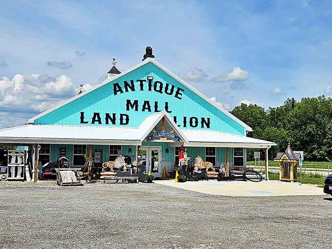 The turquoise beacon of nostalgia! Land Lion Antique Mall's distinctive exterior promises treasures within, standing proudly against the Ohio sky.