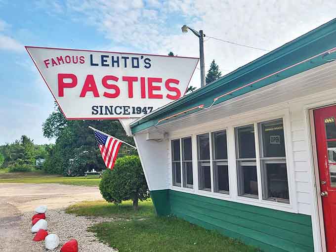 The iconic Lehto's Pasties sign has been beckoning hungry travelers along US-2 since 1947, promising hand-held happiness in a flaky crust.