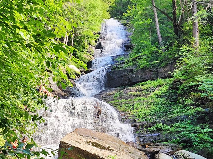 Nature's masterpiece unfolds in tiers of white water cascading down dark rock faces. Vermont showing off again, as if the maple syrup wasn't enough.