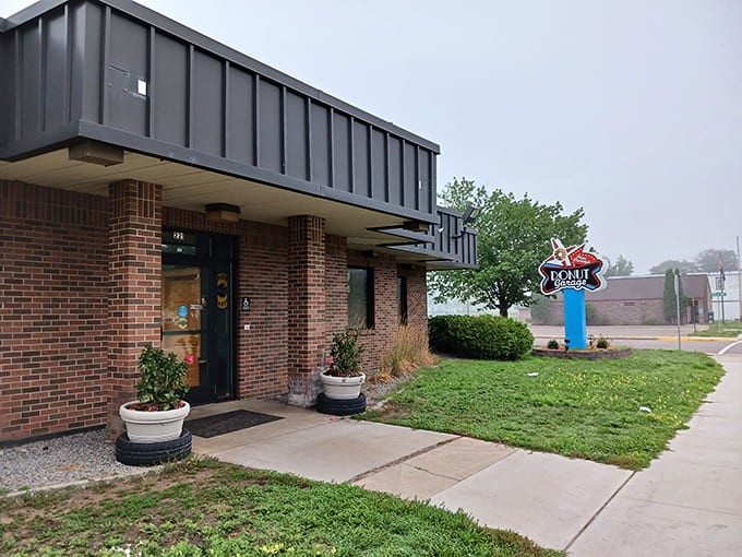 The retro-cool exterior of MacDaddy's Donut Garage stands like a beacon of sweetness in Ironton, promising sugary treasures within its unassuming brick walls.