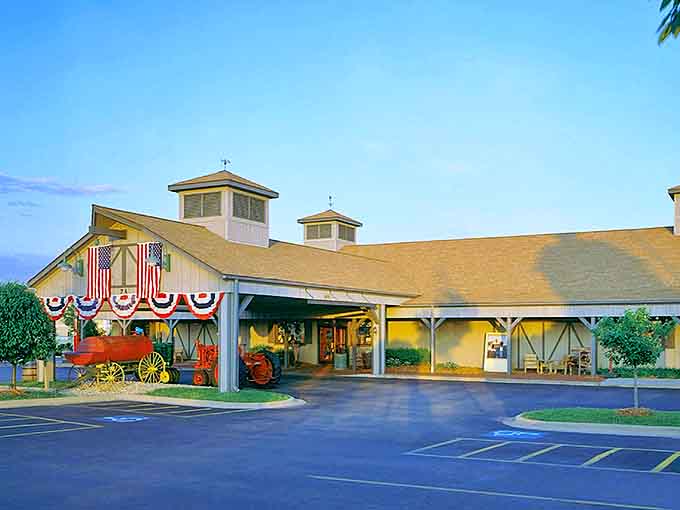 The barn-like exterior of The Machine Shed welcomes visitors with rustic charm and patriotic flair, promising comfort food that celebrates America's heartland.