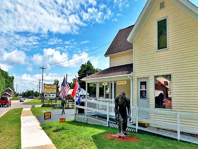 Muldoons Pasties & Gifts: A cheerful yellow house with a welcoming porch, where Michigan's favorite hand-held meal awaits hungry travelers.