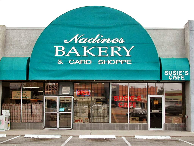 That teal awning isn't just a sunshade, it's a beacon of hope for sweet-toothed wanderers seeking salvation from ordinary desserts.