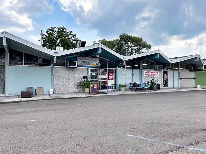 The unassuming exterior of Naing Myanmar Family Restaurant proves once again that culinary treasures often hide in the most modest packages.